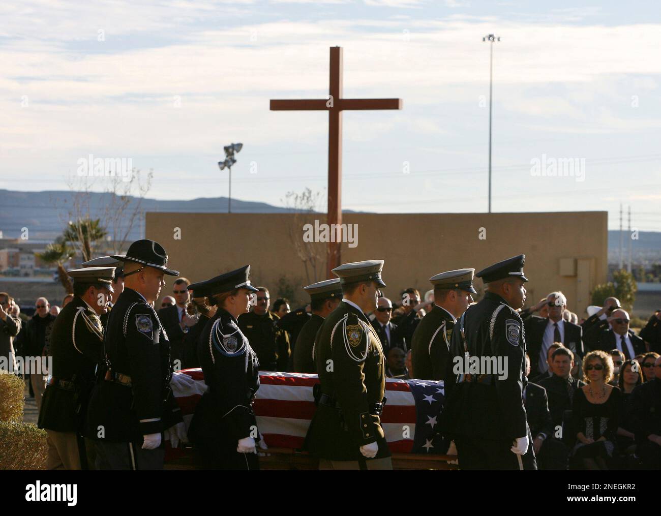 Pall bearers carry the casket of slain security officer Stanley Cooper ...