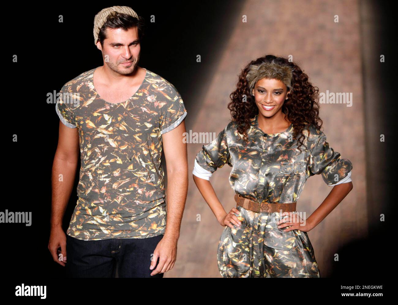 Brazilian actors Thiago Lacerda, left, and Tais Araujo model designs of ...
