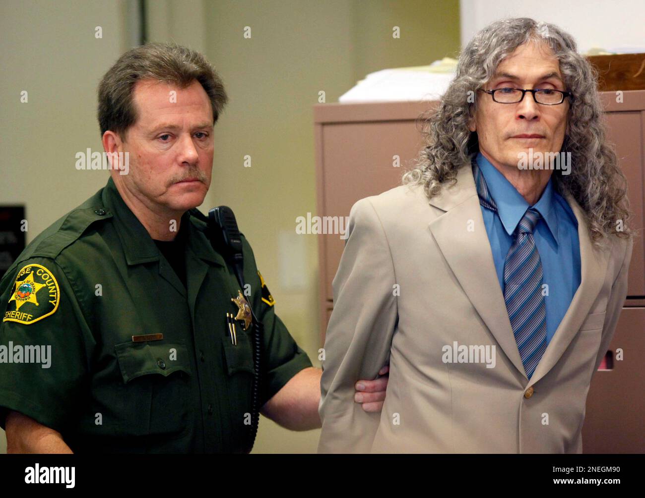 Rodney Alcala, right, is led into court for opening statements of his ...