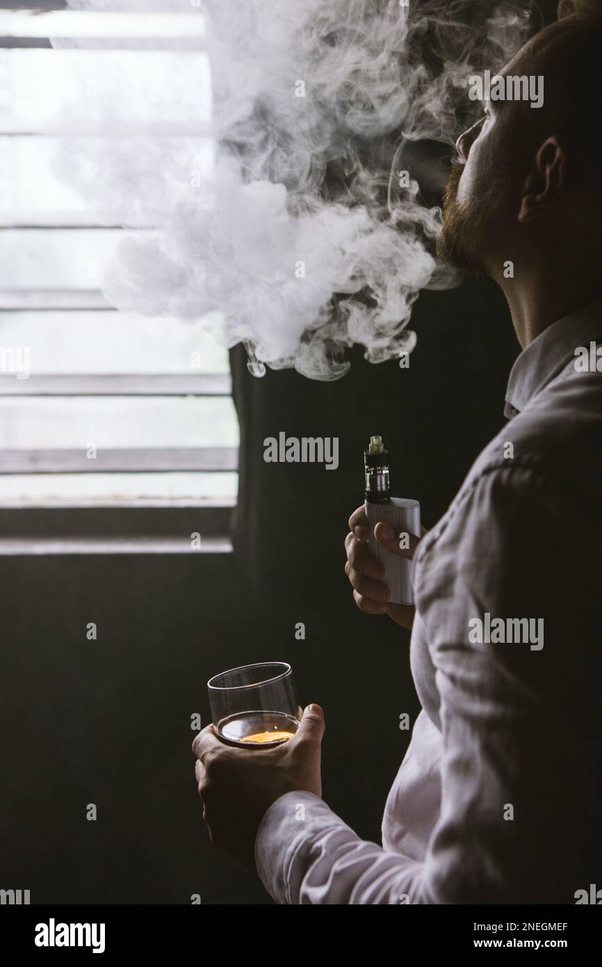 Pensive looking male in relaxed mood Stock Photo - Alamy