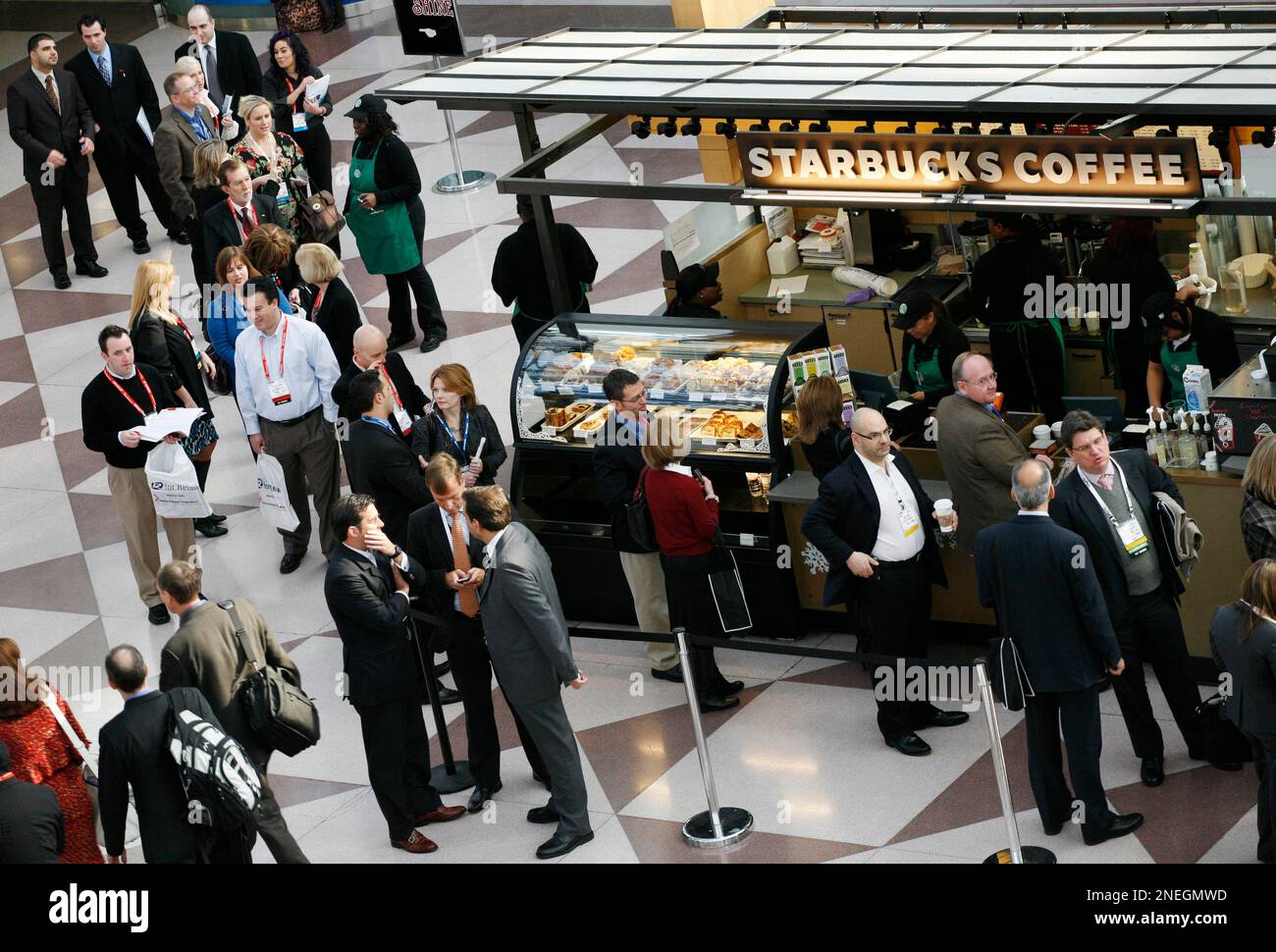 A crowd gathers at a Starbucks located in the Jacob Javits Convention ...
