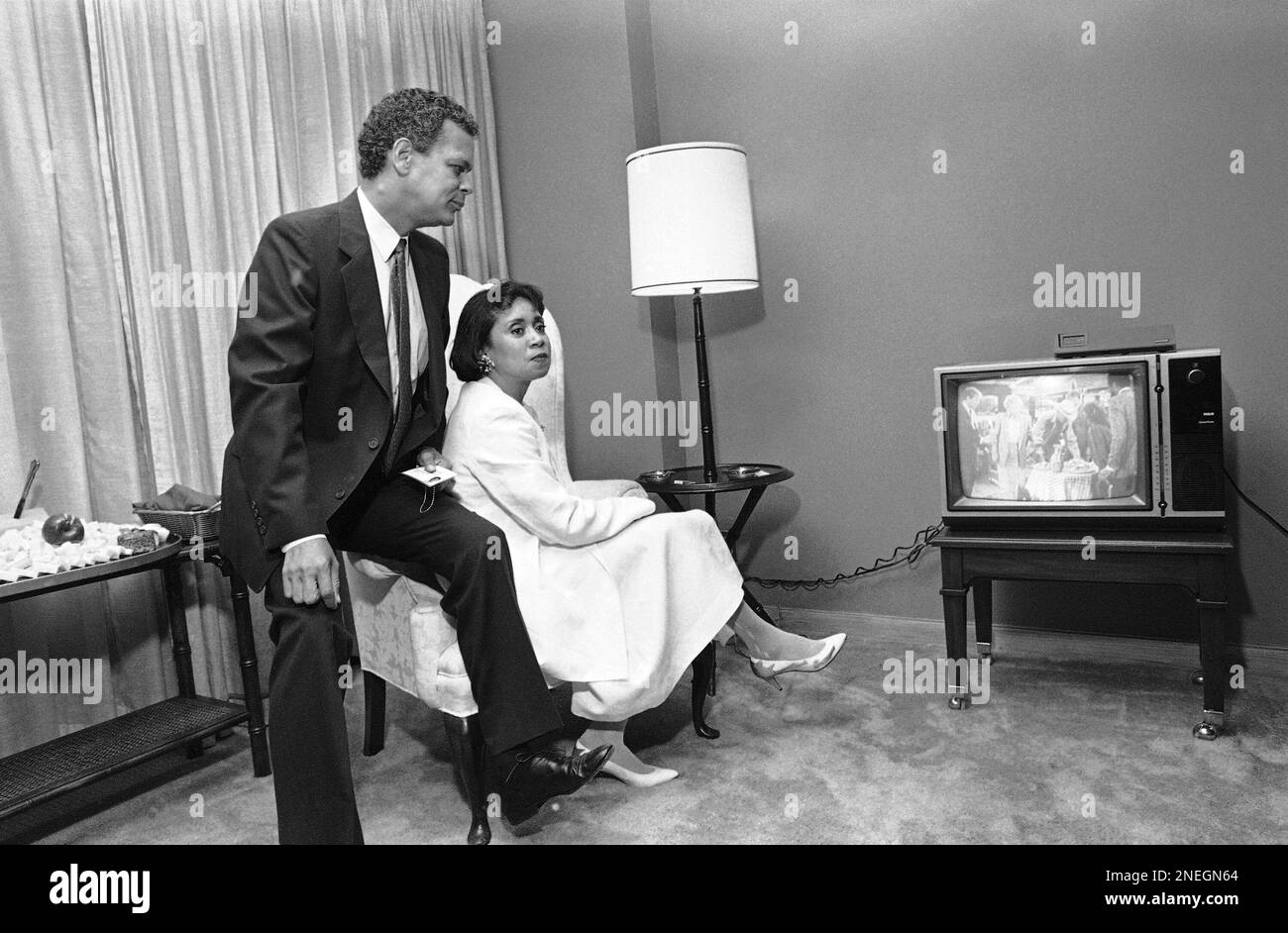 Julian Bond and his wife, Alice, watch television in an Atlanta hotel ...