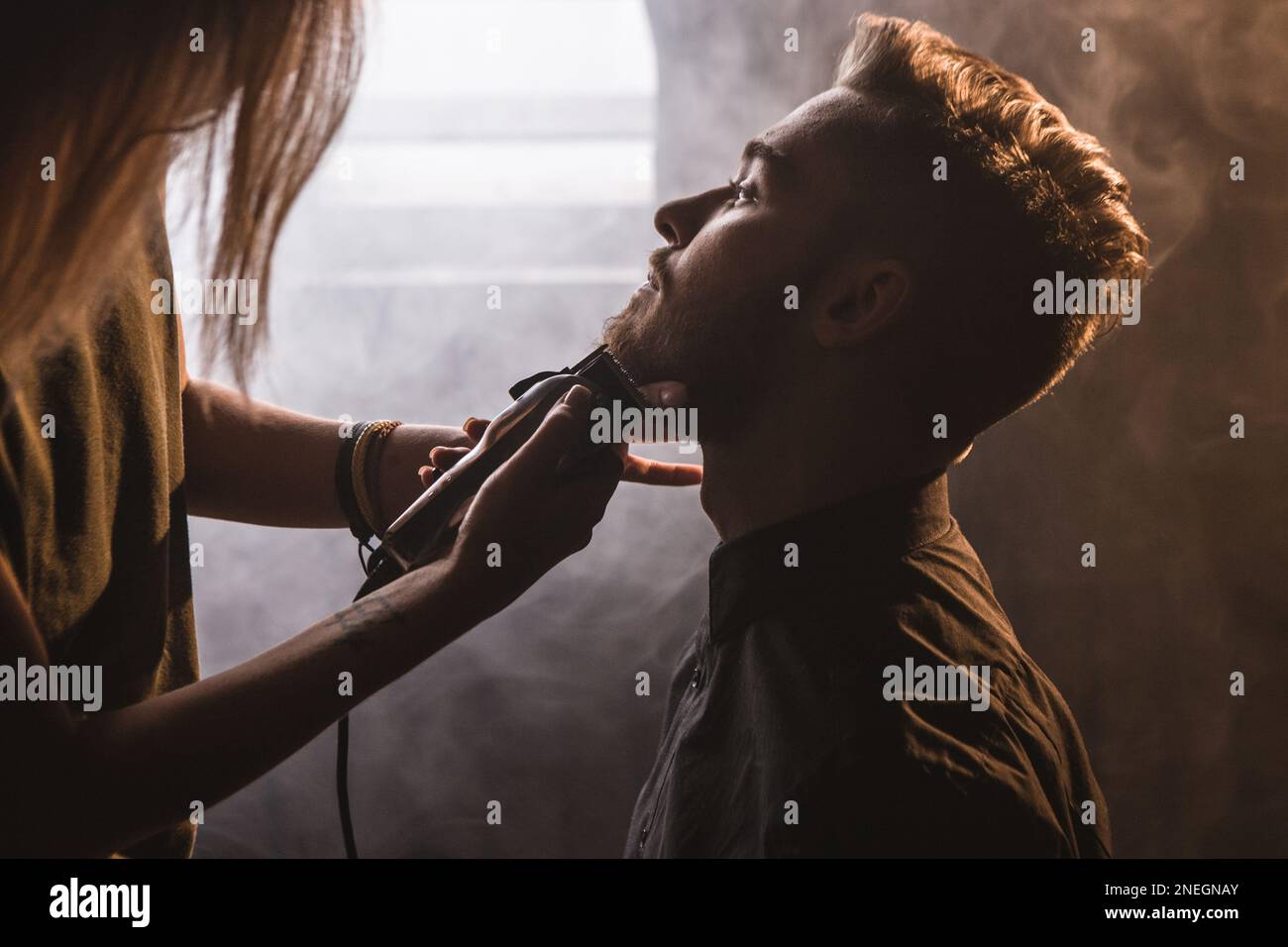 Female barber shaving hi-res stock photography and images - Alamy