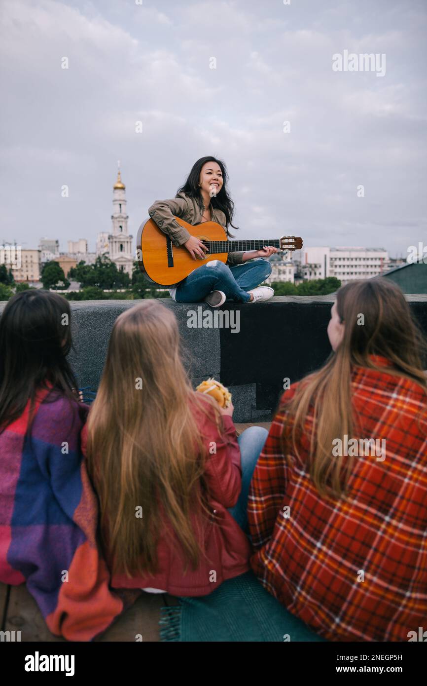 Happy singer and fans on live show Stock Photo - Alamy