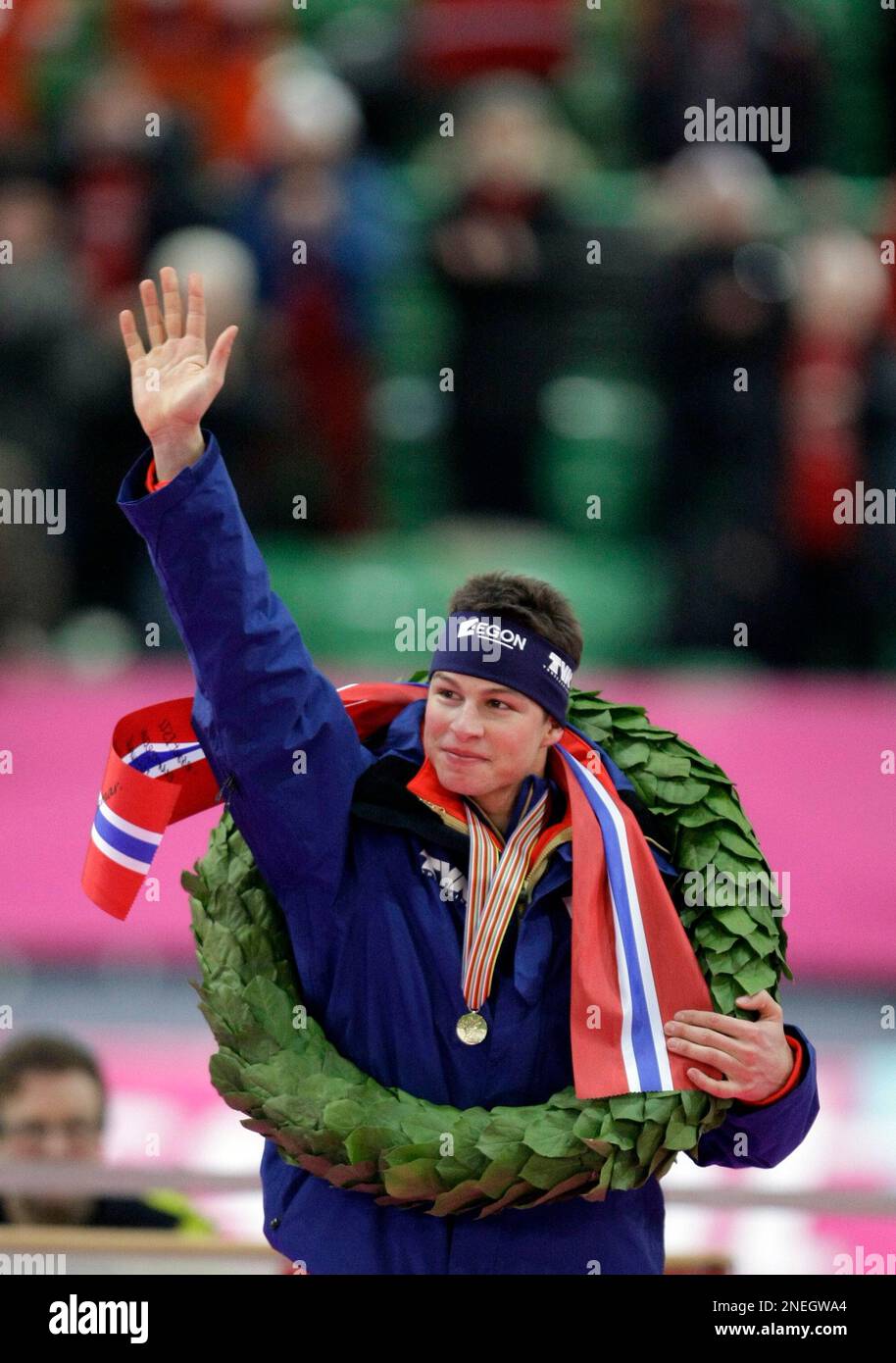 The Netherlands' Sven Kramer celebrates on the podium with his gold ...