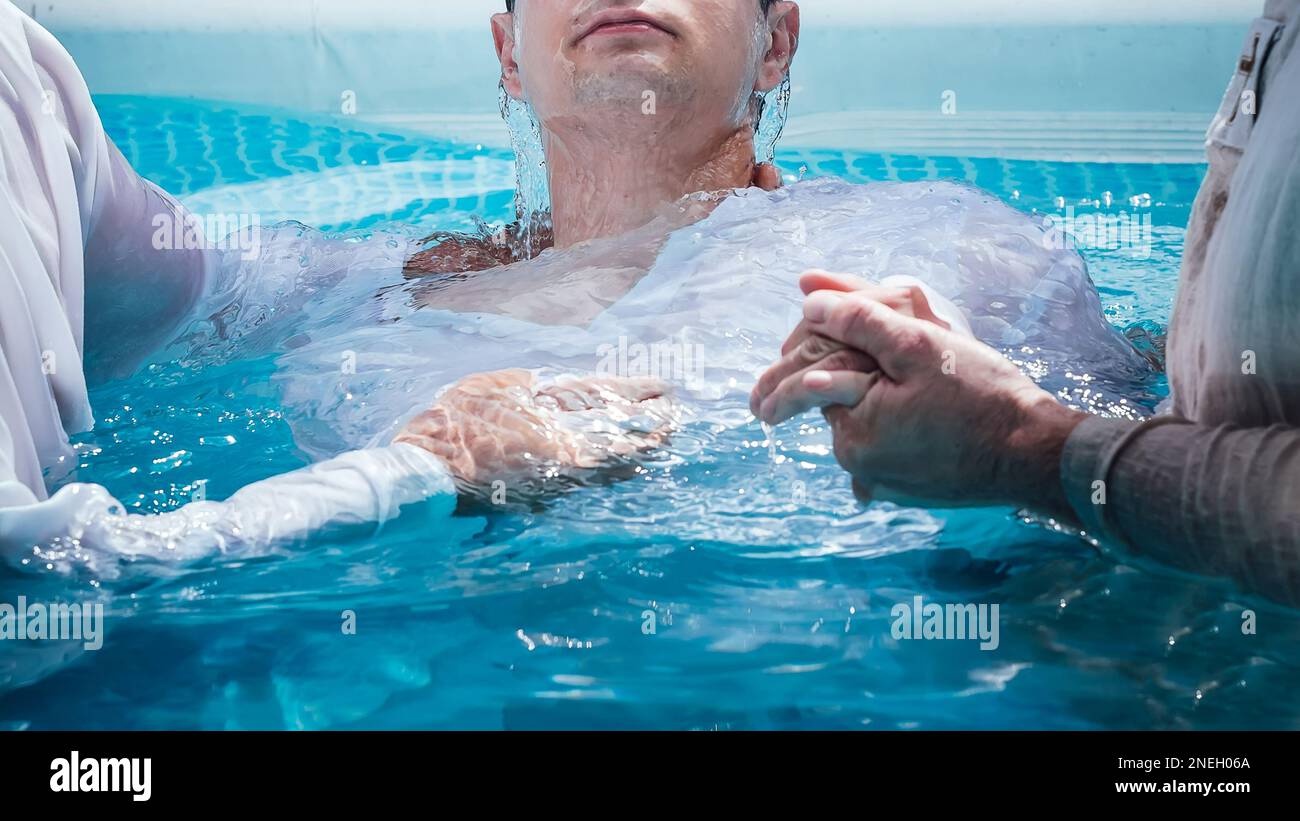 Catholic baptism adult hi-res stock photography and images - Alamy