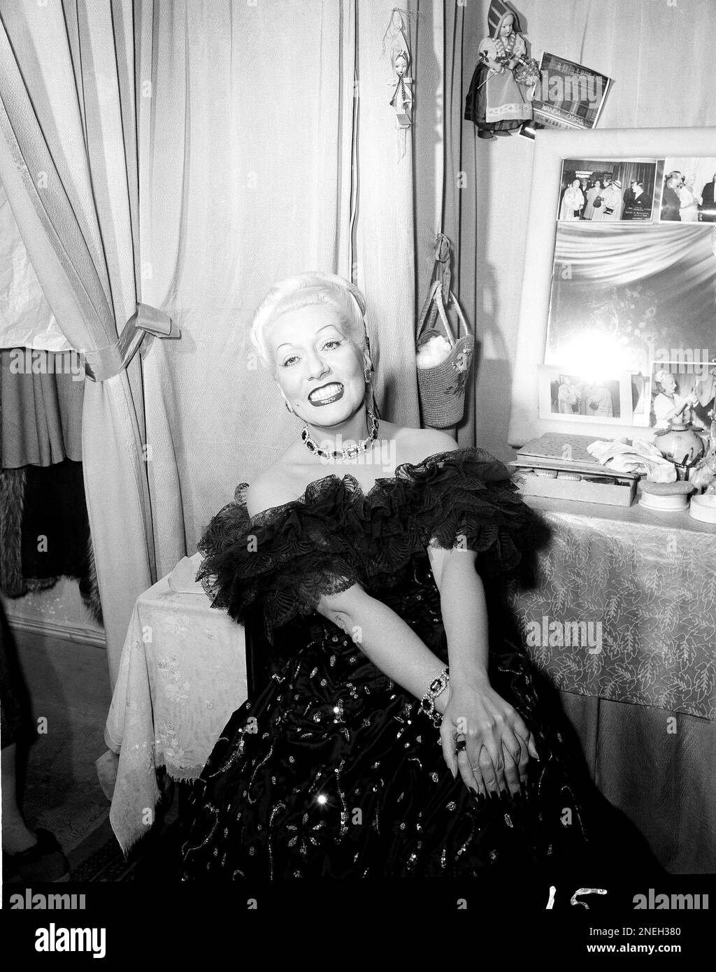 Wanda Osiris is shown in her dressing room shortly going on the stage ...