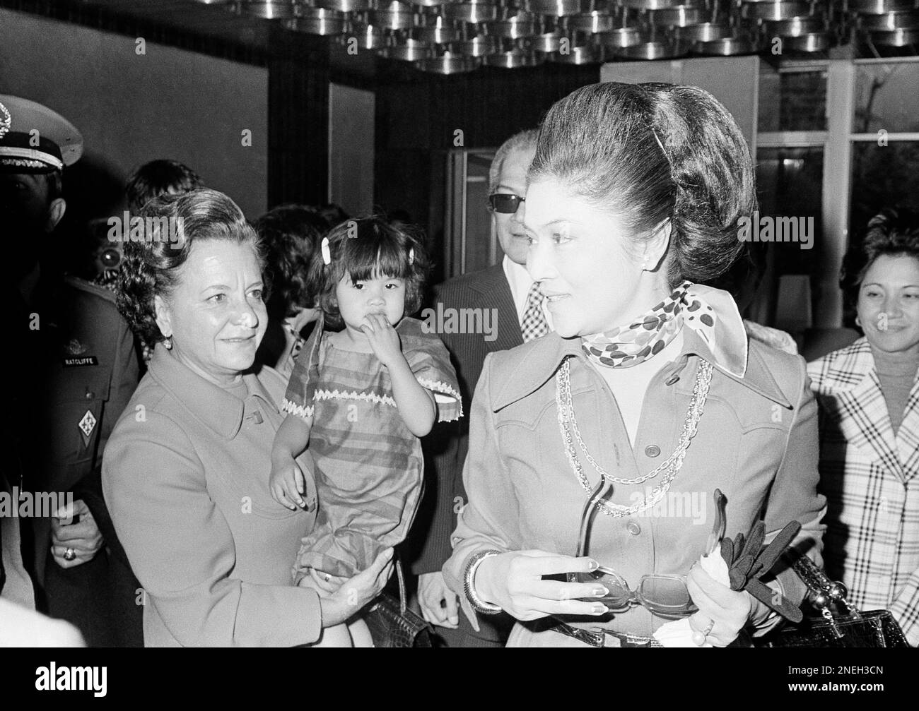 Mrs. Ferdinand (Imelda) Marcos on a visit to Mexico, is given a tour by ...