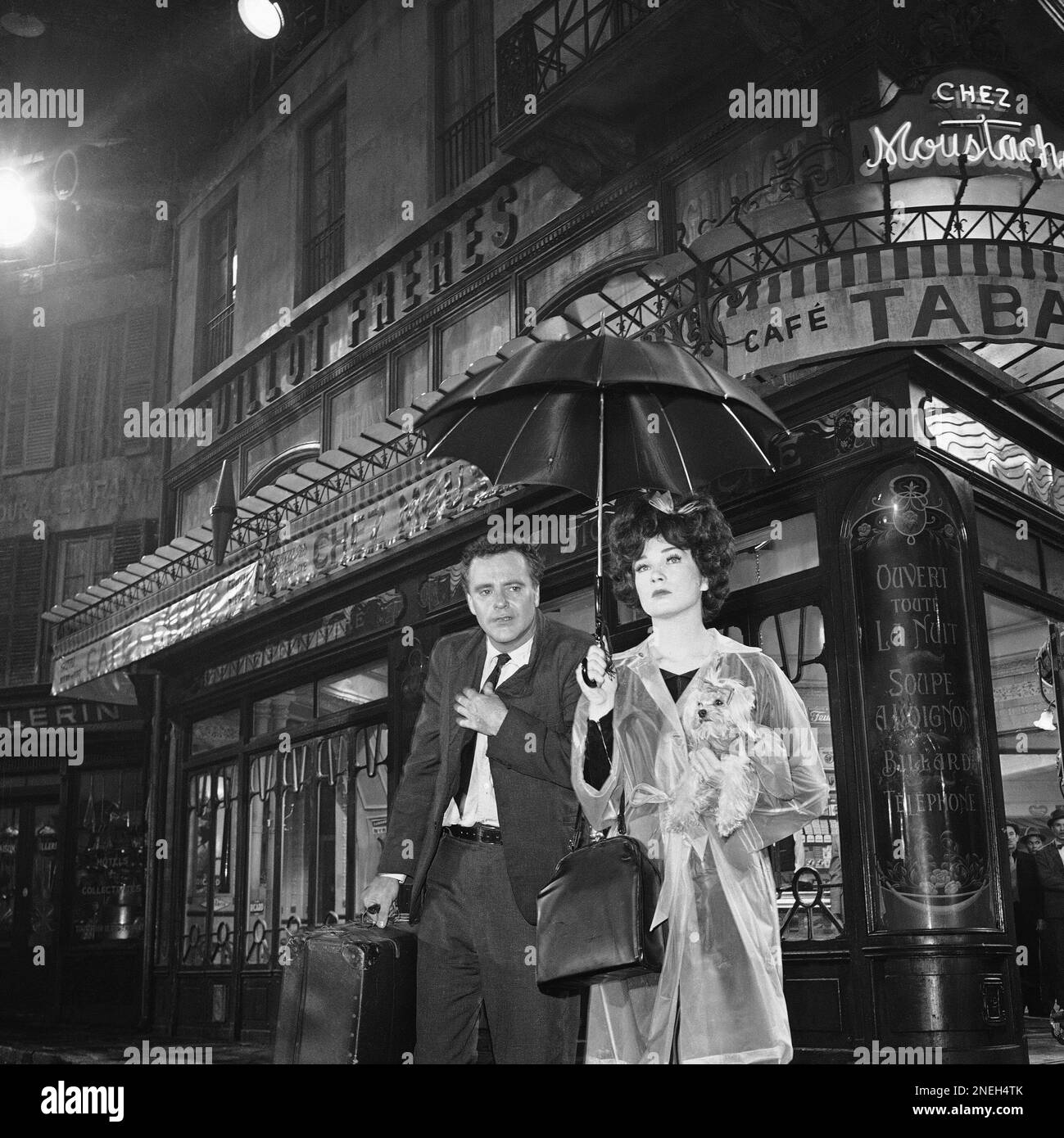 Shivering Jack Lemmon and well protected Shirley MacLaine cross the ...