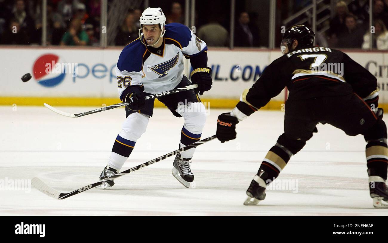 St. Louis Blues right wing B.J. Crombeen (26) lifts the puck over the ...