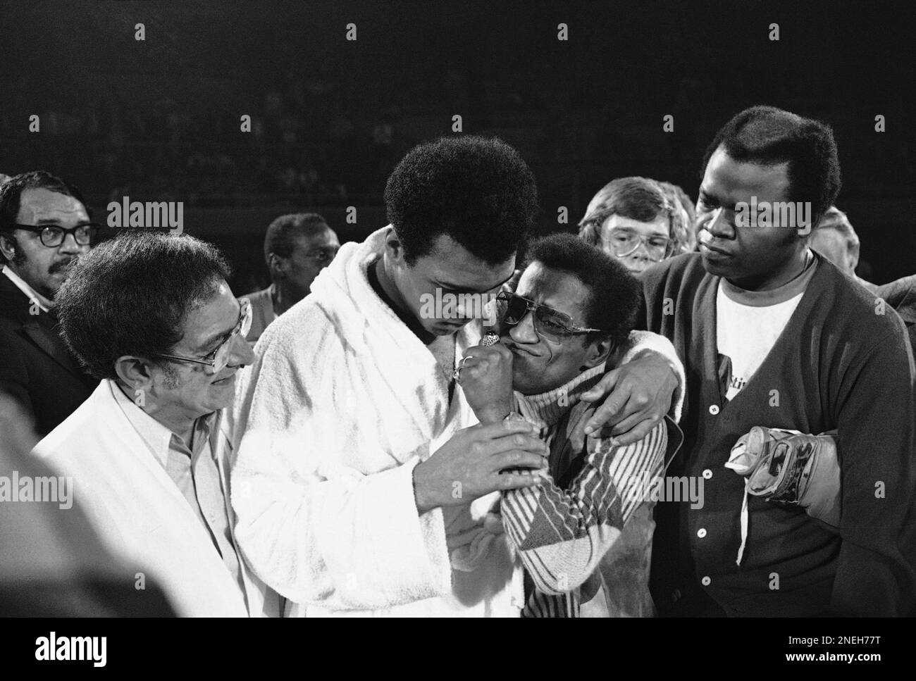 Muhammad Ali gets a bear-hug in the ring from Sammy Davis Jr. moments ...