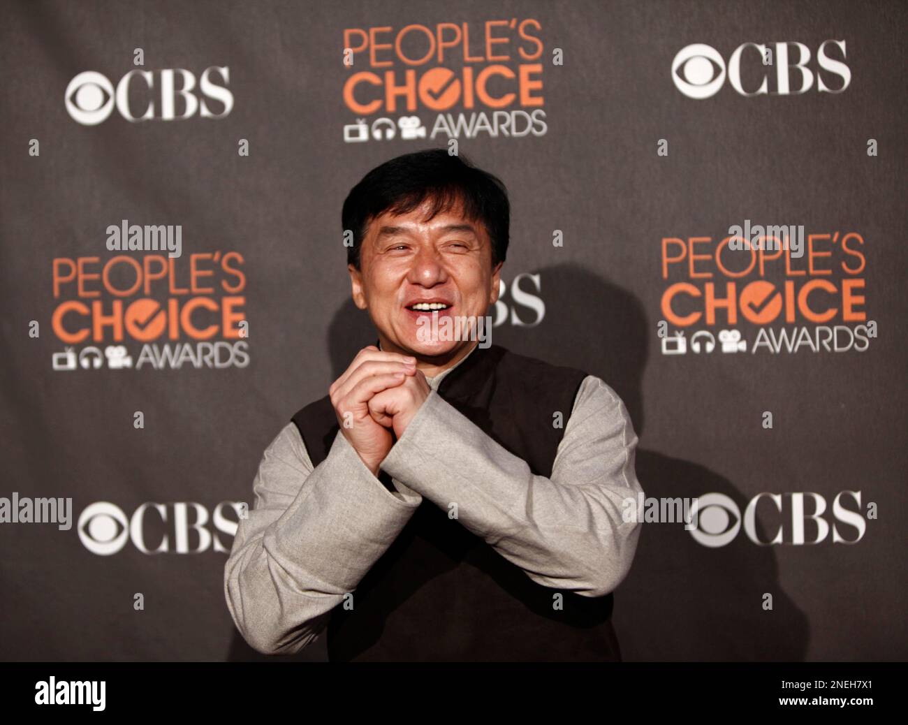 Jackie Chan arrives at the People's Choice Awards on Wednesday Jan. 6 ...