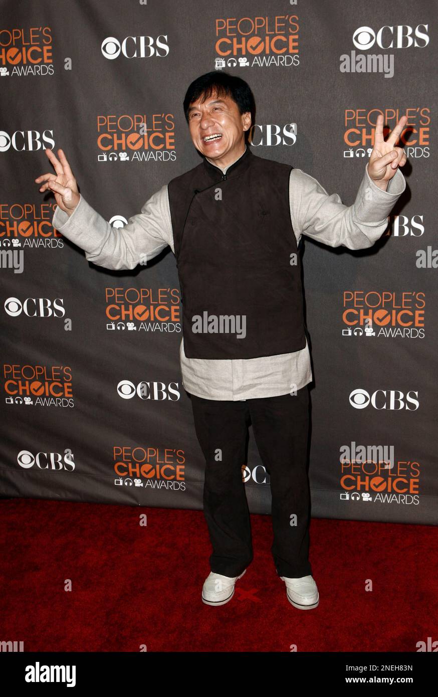 Jackie Chan arrives at the People's Choice Awards on Wednesday Jan. 6 ...