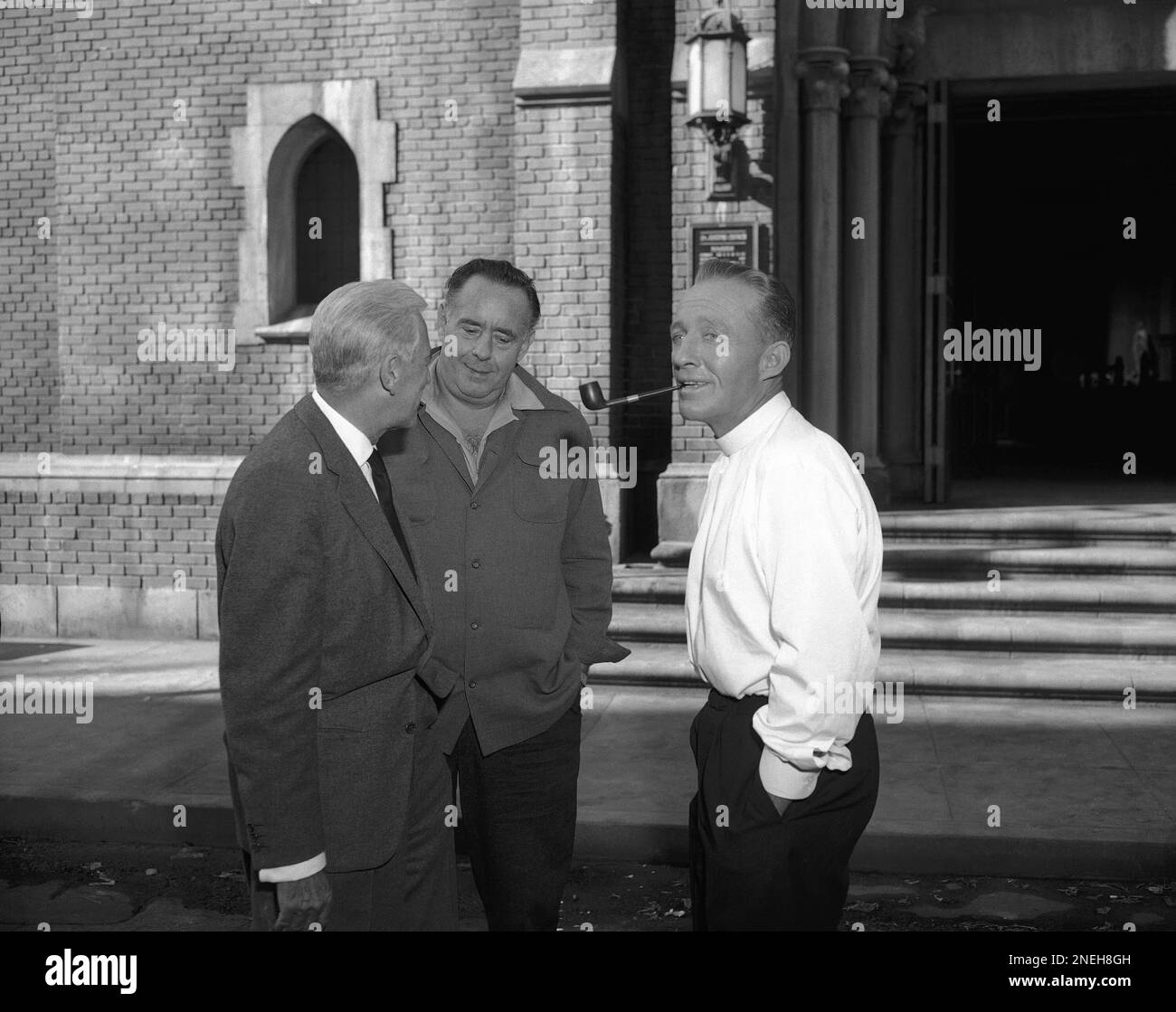 Bing Crosby (right) relaxing between scenes on the Hollywood set of ...