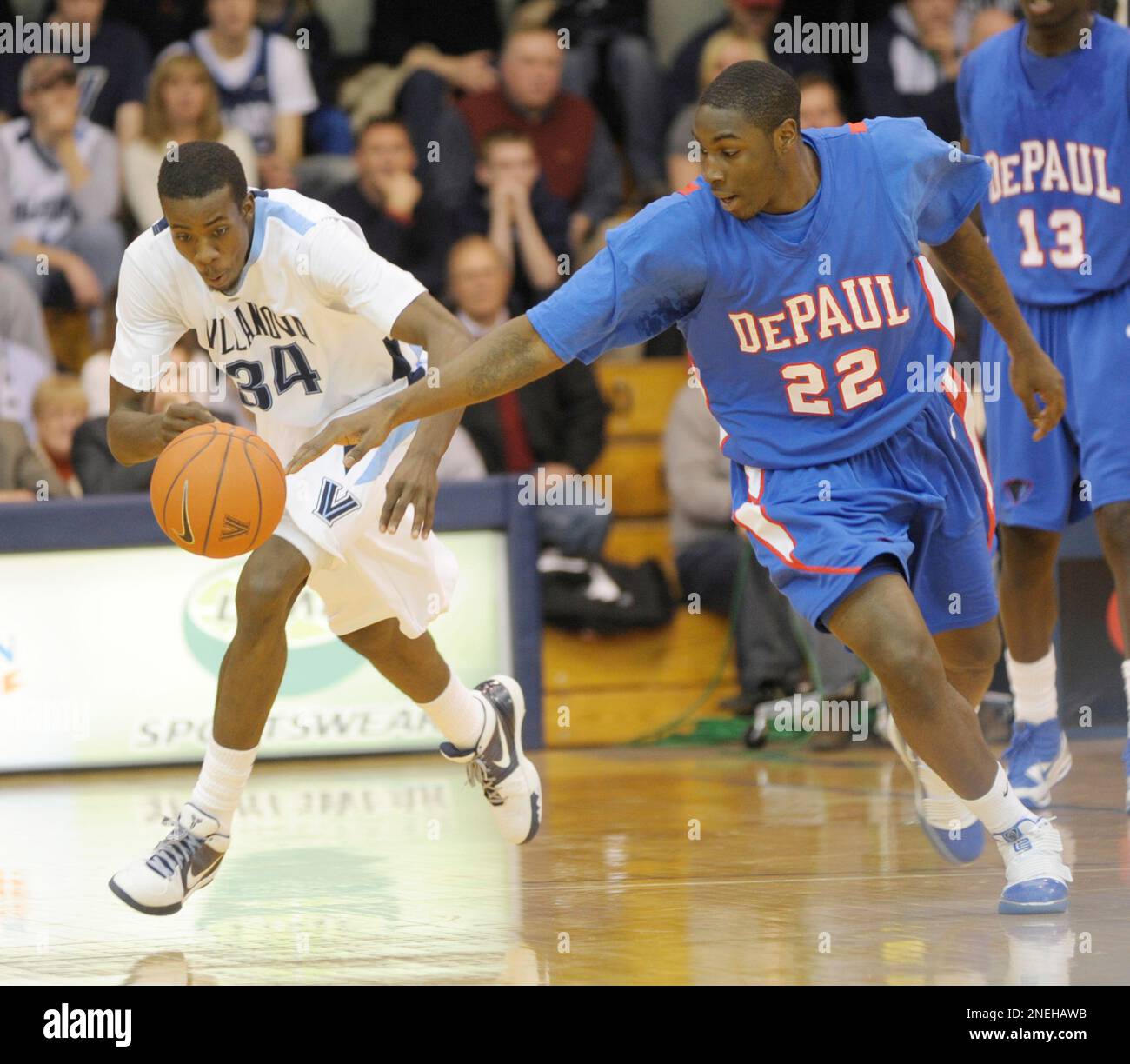 DePaul forward Tony Freeland, right, chases down a loose ball against ...