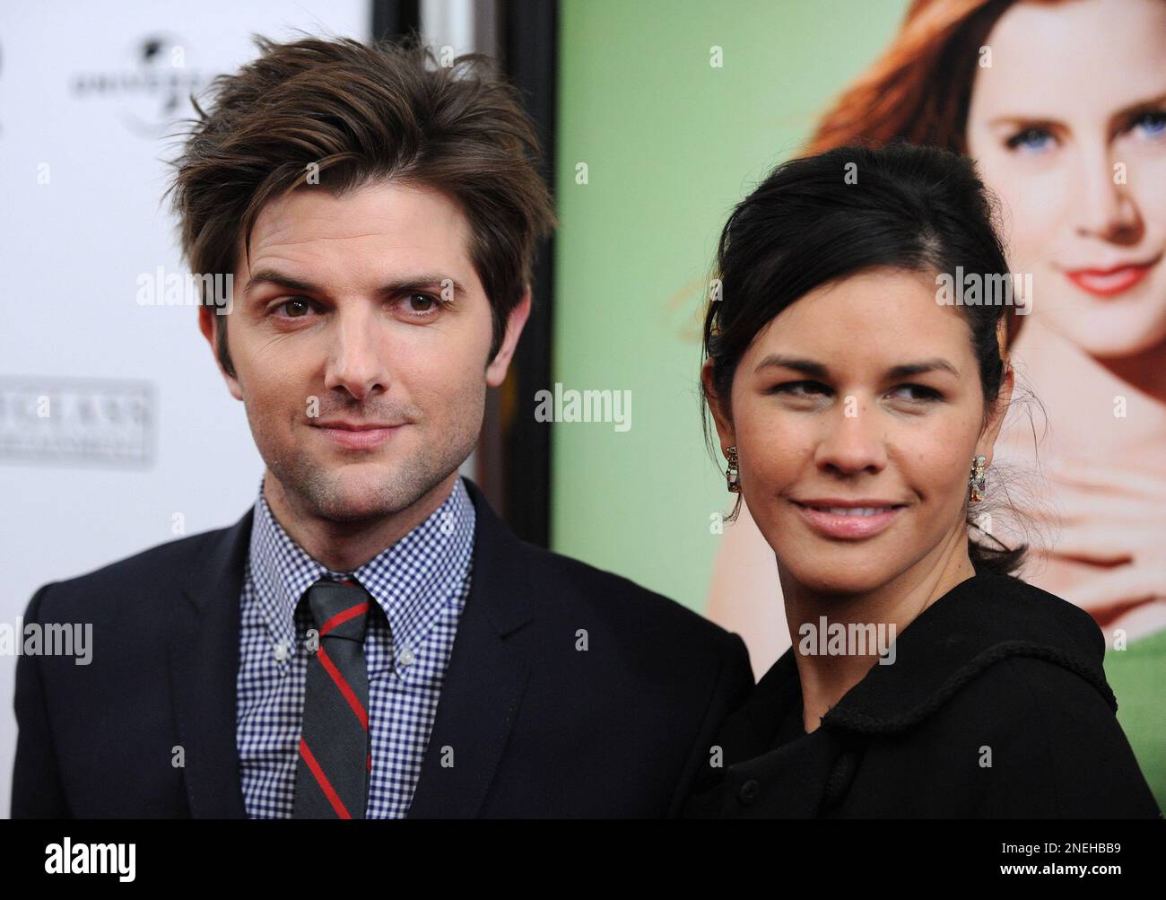 Actor Adam Scott and wife Naomi Scott, right, attend the premiere of ...