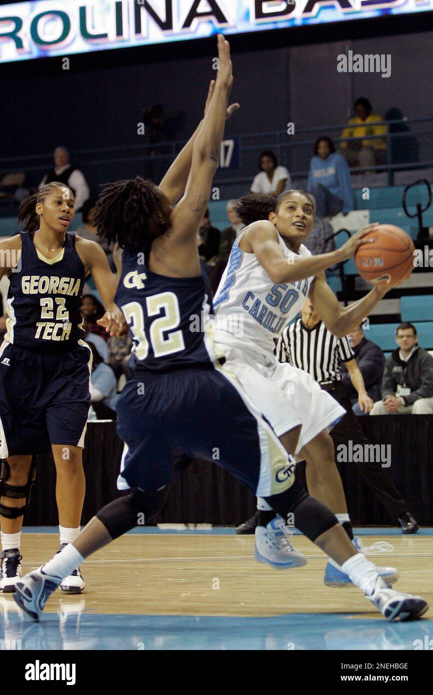 North Carolina's Italee Lucas (50) drives past Georgia Tech's Chelsea ...