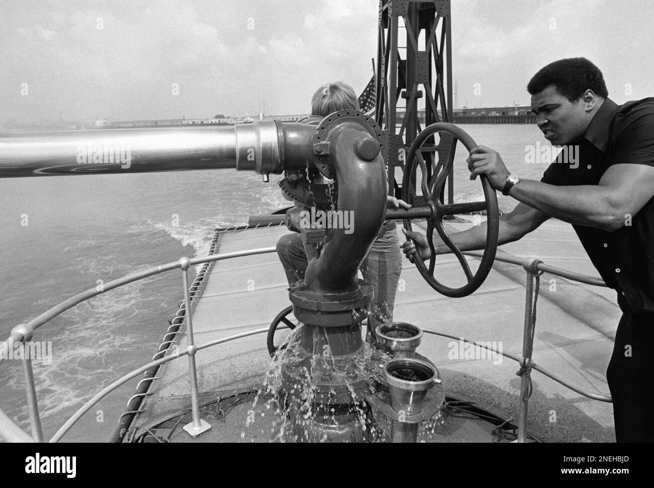 Former heavyweight champion Muhammad Ali has a turn on a giant water ...