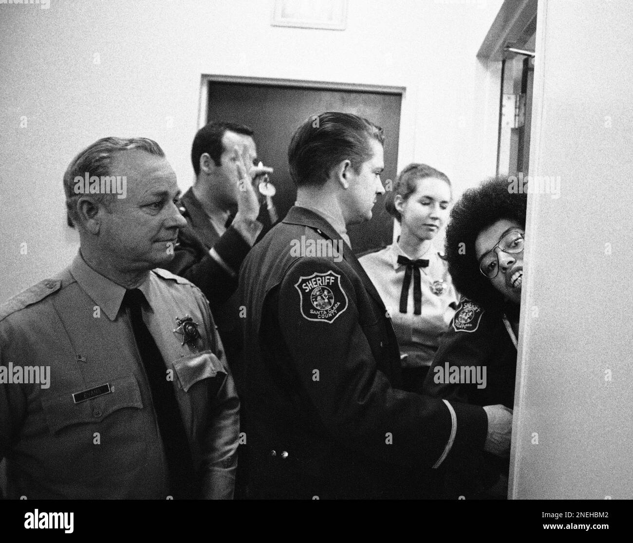 Fania Jordan, sister of Angela Davis, sneaks a last peek back as she is ...