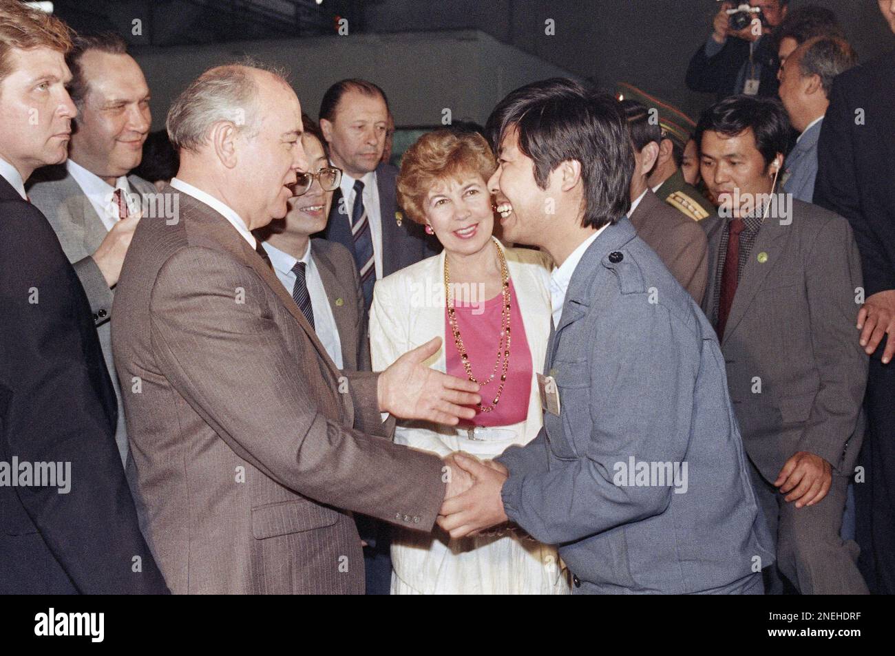 Soviet President Mikhail S. Gorbachev shakes hands with a Chinese ...