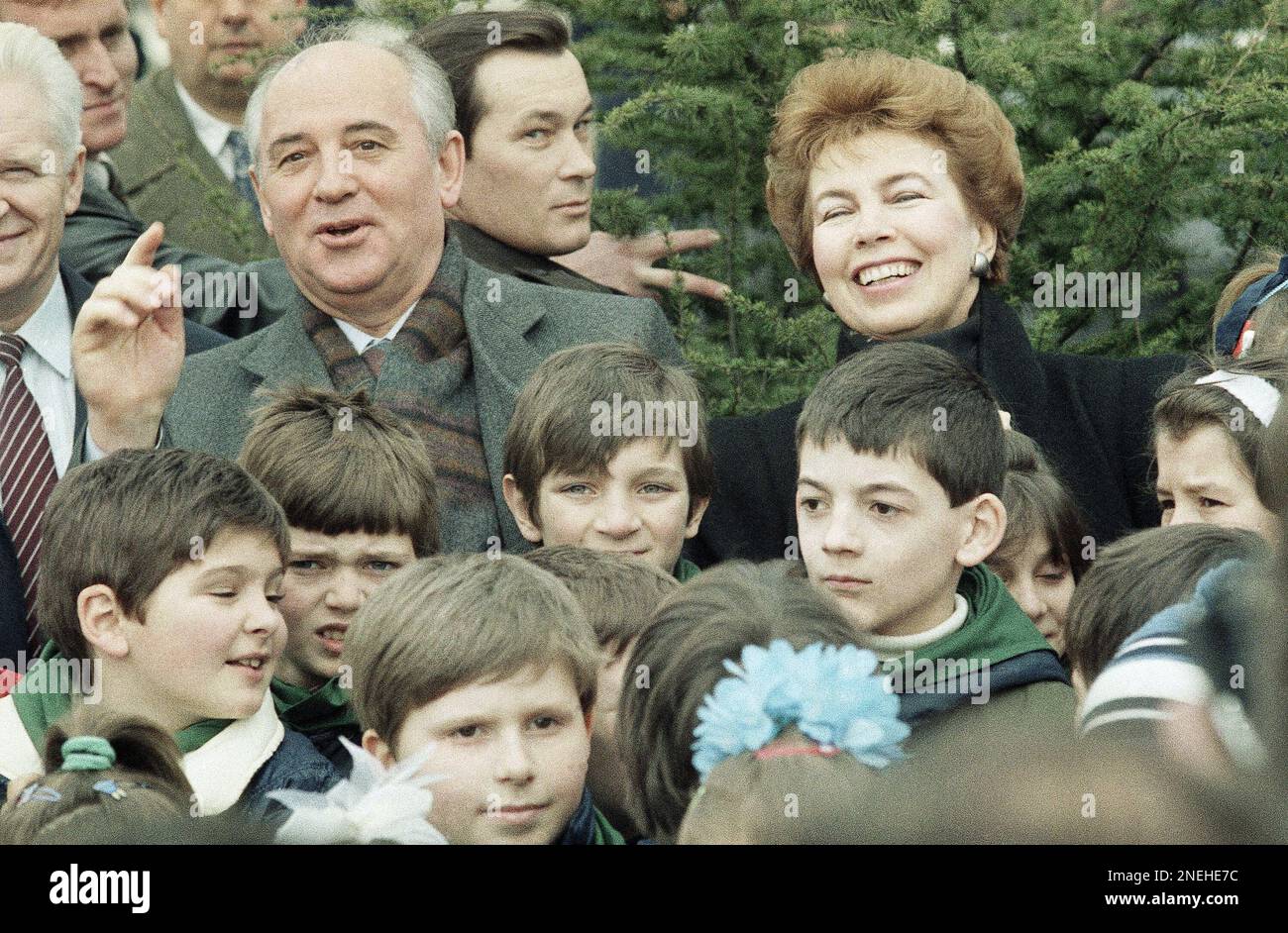Soviet leader Mikhail Gorbachev with his wife Raisa pose with a group ...