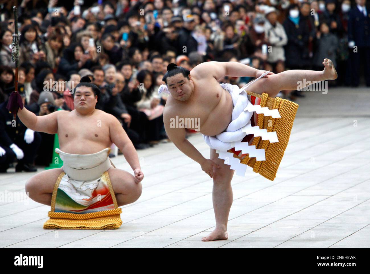 Sumo grand champion or yokozuna Asashoryu, right, from Mongolia ...