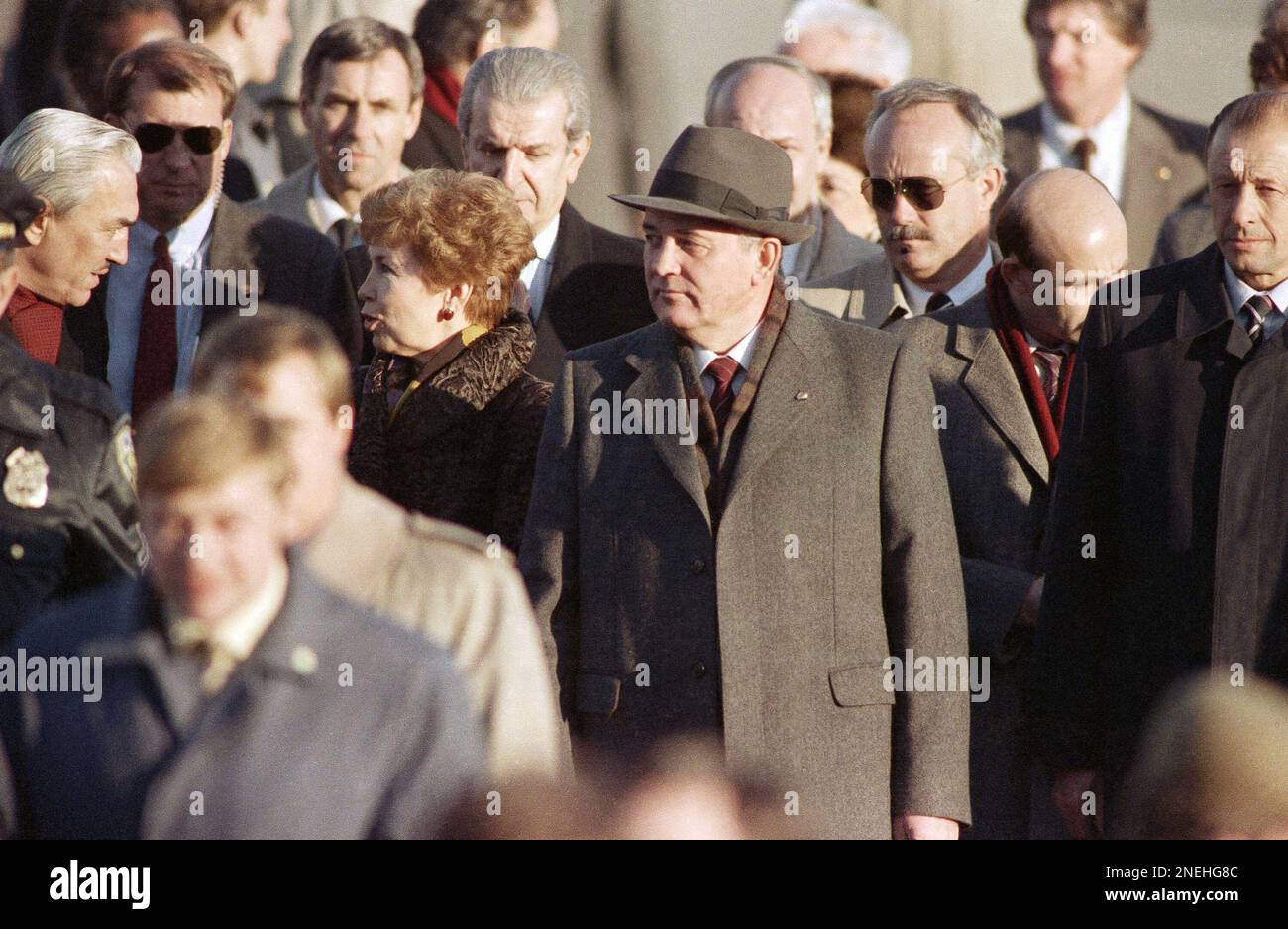 Soviet leader Mikhail Gorbachev and his wife Raisa are surrounded by ...