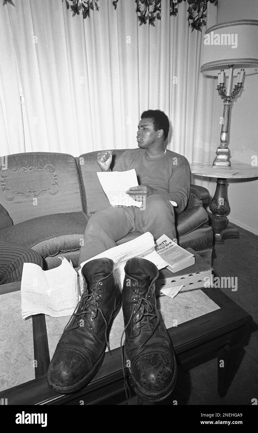 Muhammad Ali relaxes in his Miami Beach Hotel room on Tuesday, Feb. 10 ...