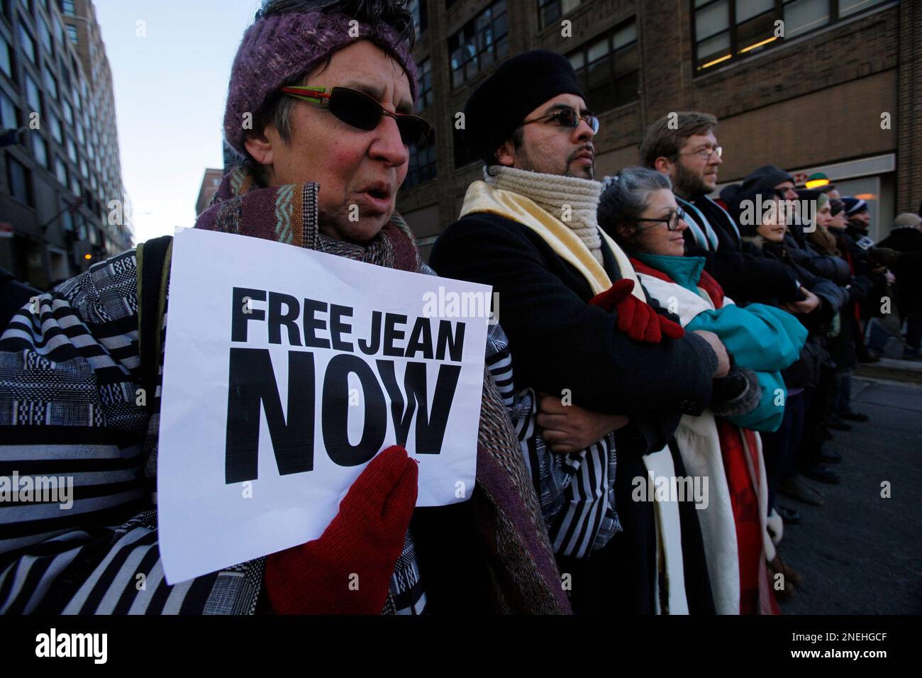 Rev. Donna Schaper, of the Jusdon Memorial Church locks arms with other ...