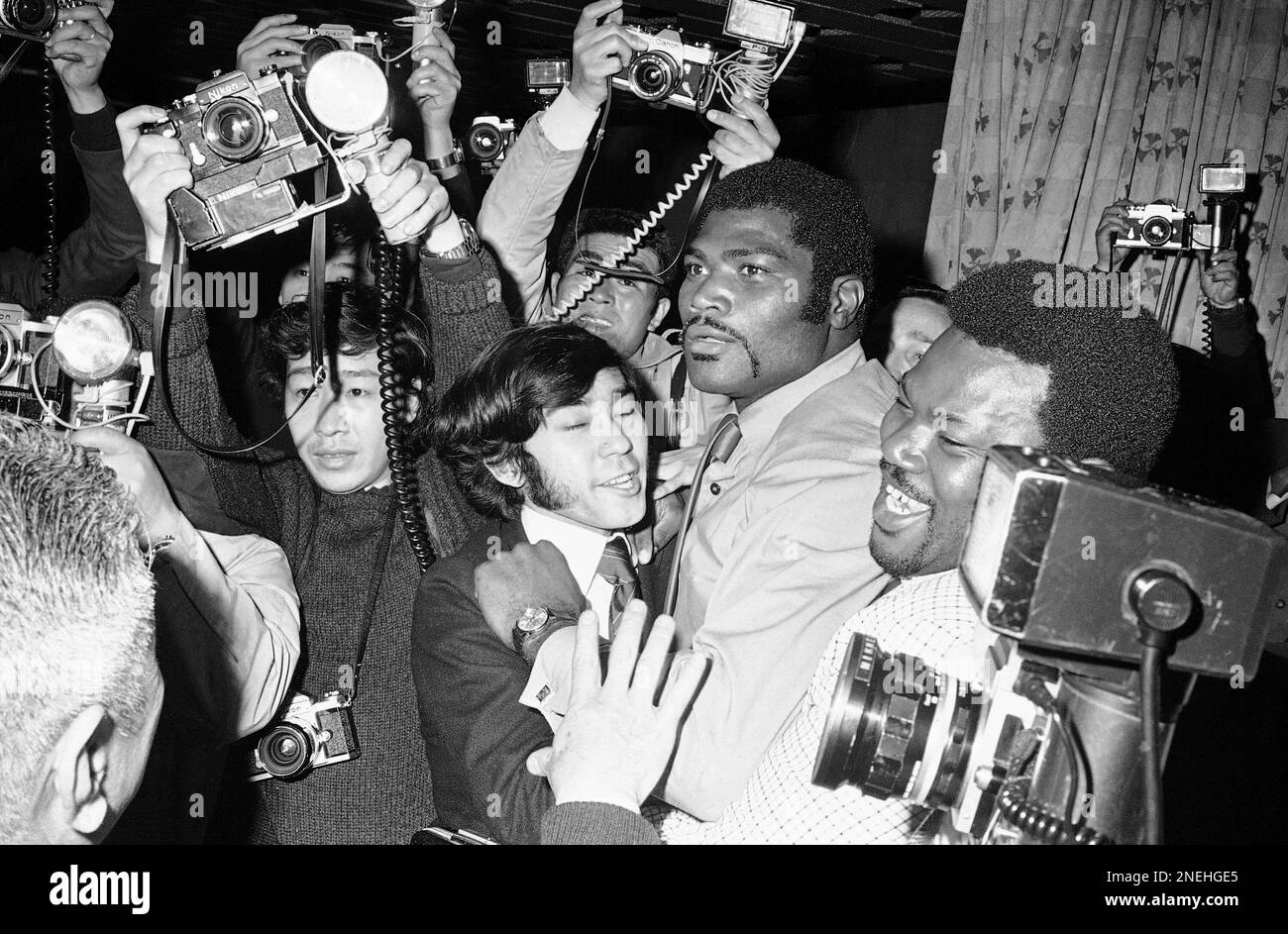 Boxer Mac Foster, center of photo at right, refused to shake hands with ...