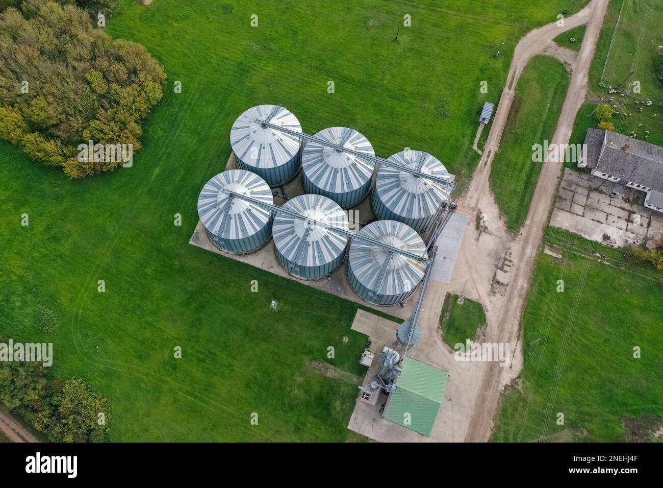 Agricultural silos on the farm in autumn, close-up drone view ...