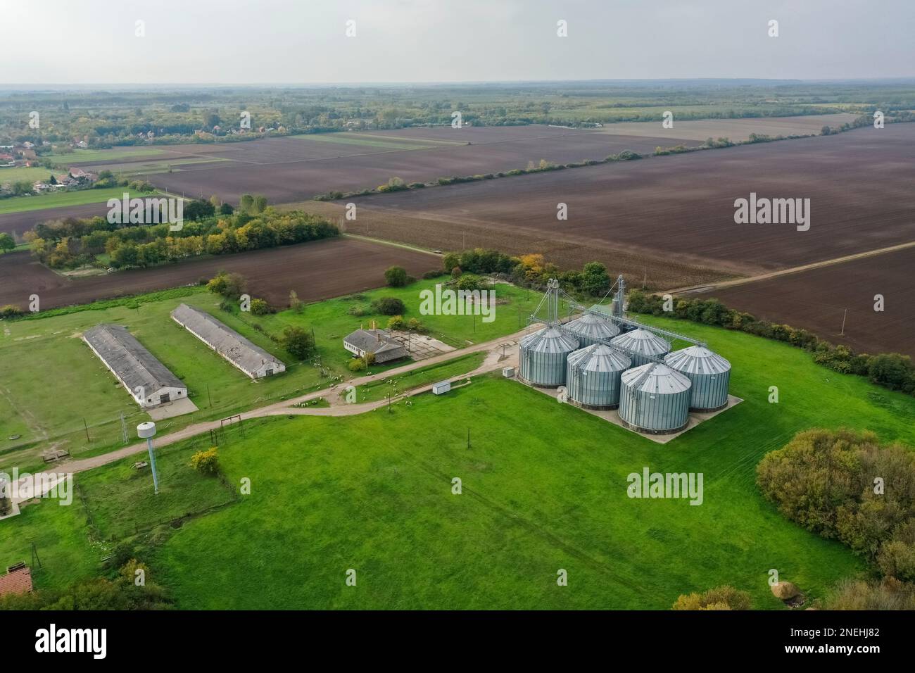 Agricultural silos on the farm in autumn, close-up drone view ...