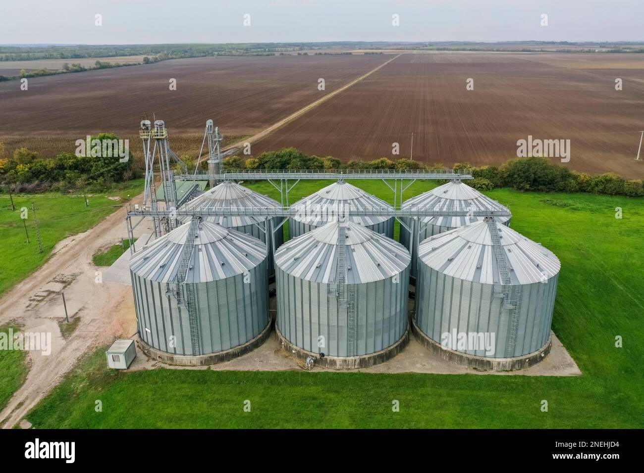 Agricultural silos on the farm in autumn, close-up drone view ...