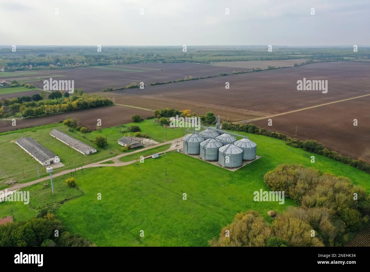 Agricultural silos on the farm in autumn, close-up drone view ...