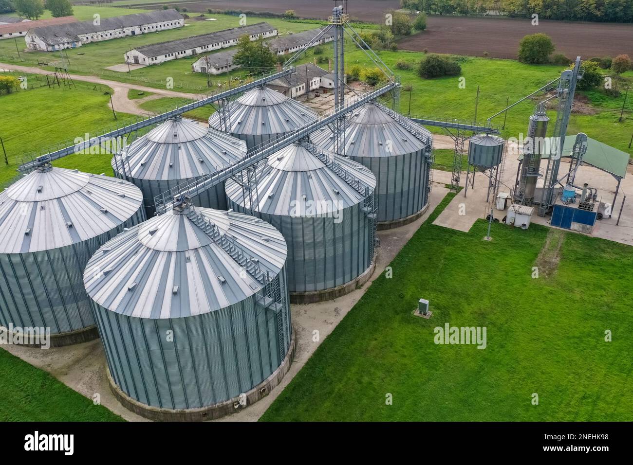 Agricultural silos on the farm in autumn, close-up drone view ...