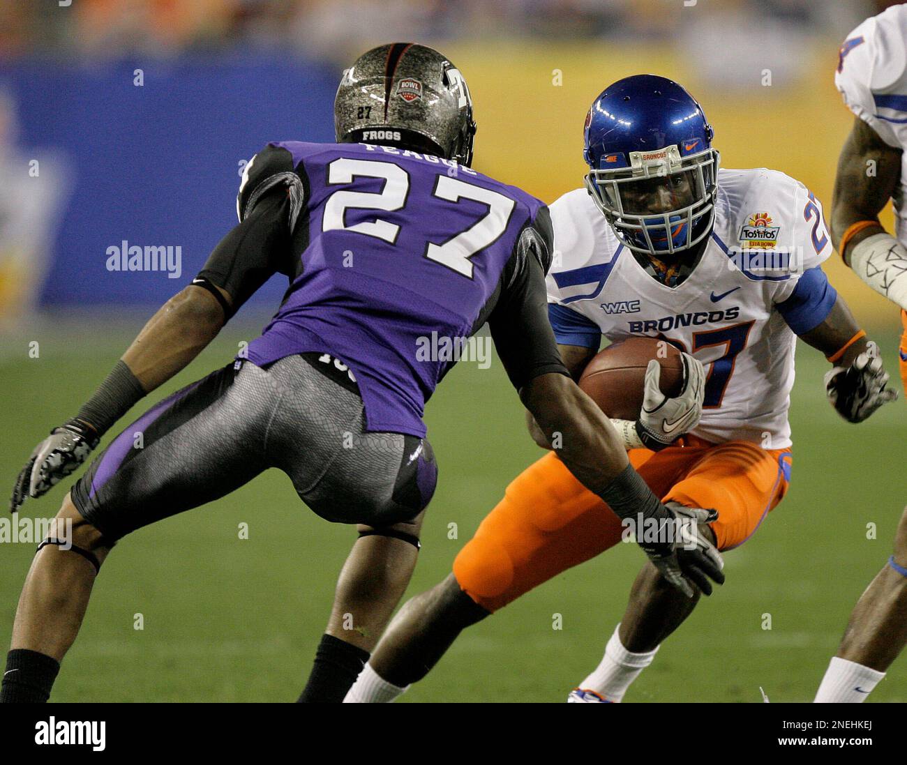 Boise State running back Jeremy Avery, right, tries to get away from ...
