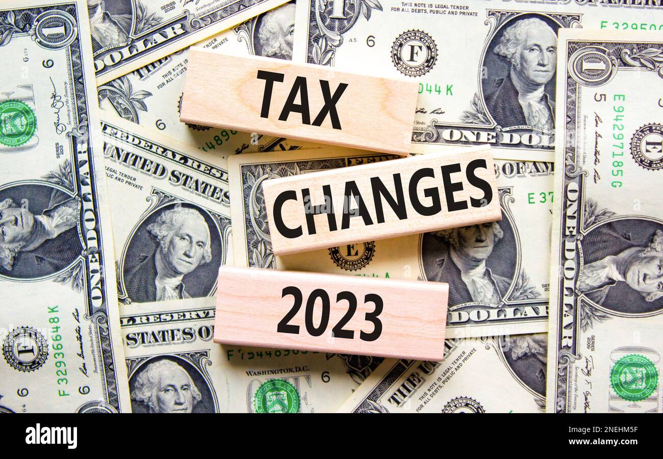 Tax changes 2023 symbol. Concept words Tax changes 2023 on wooden ...