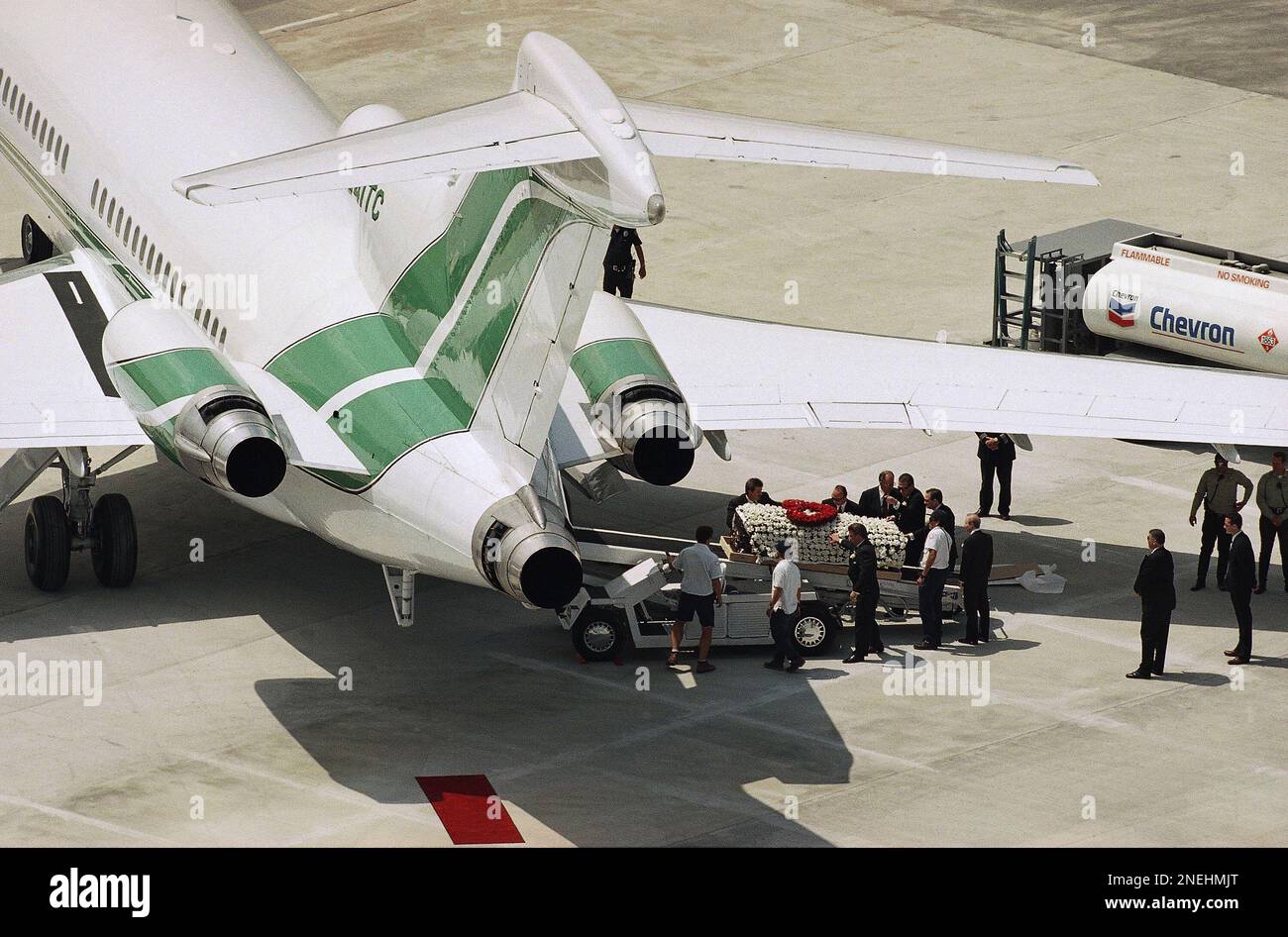 The casket carrying the body of Frank Sinatra is loaded aboard a Boeing ...