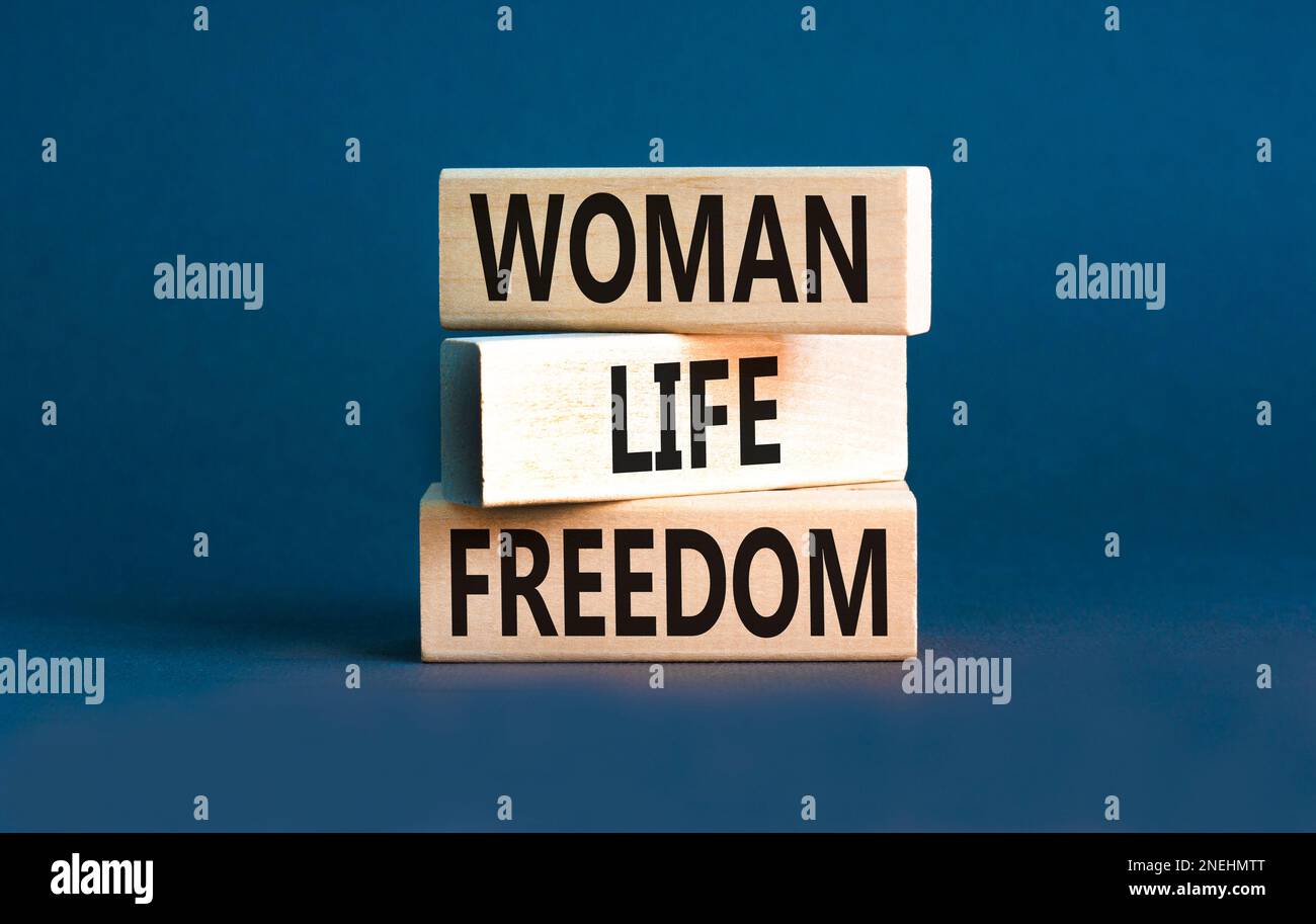 Woman life freedom symbol. Concept words Woman Life Freedom on wooden ...