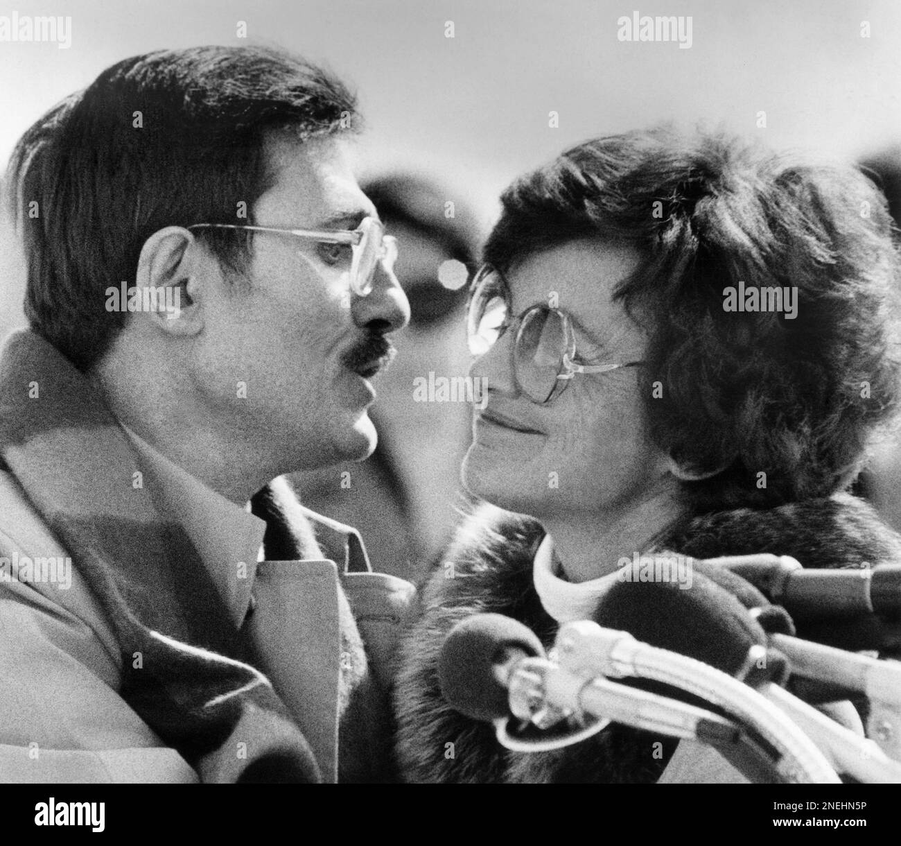 Cable News Network reporter Jeremy Levin prepares to kiss his wife ...