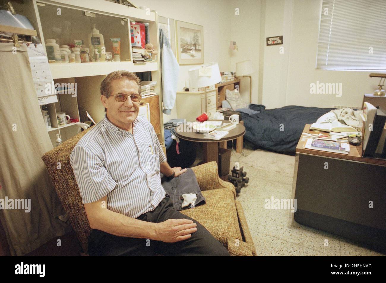 Harvey Martin, of L.A. International Church poses in his room on ...