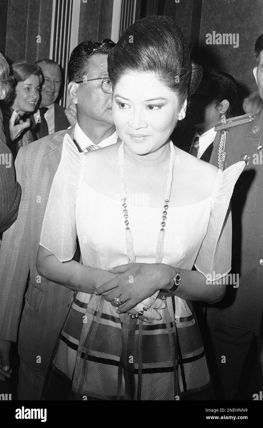 Mrs. Imelda Marcos , wife of the President of Philippines holds her ...