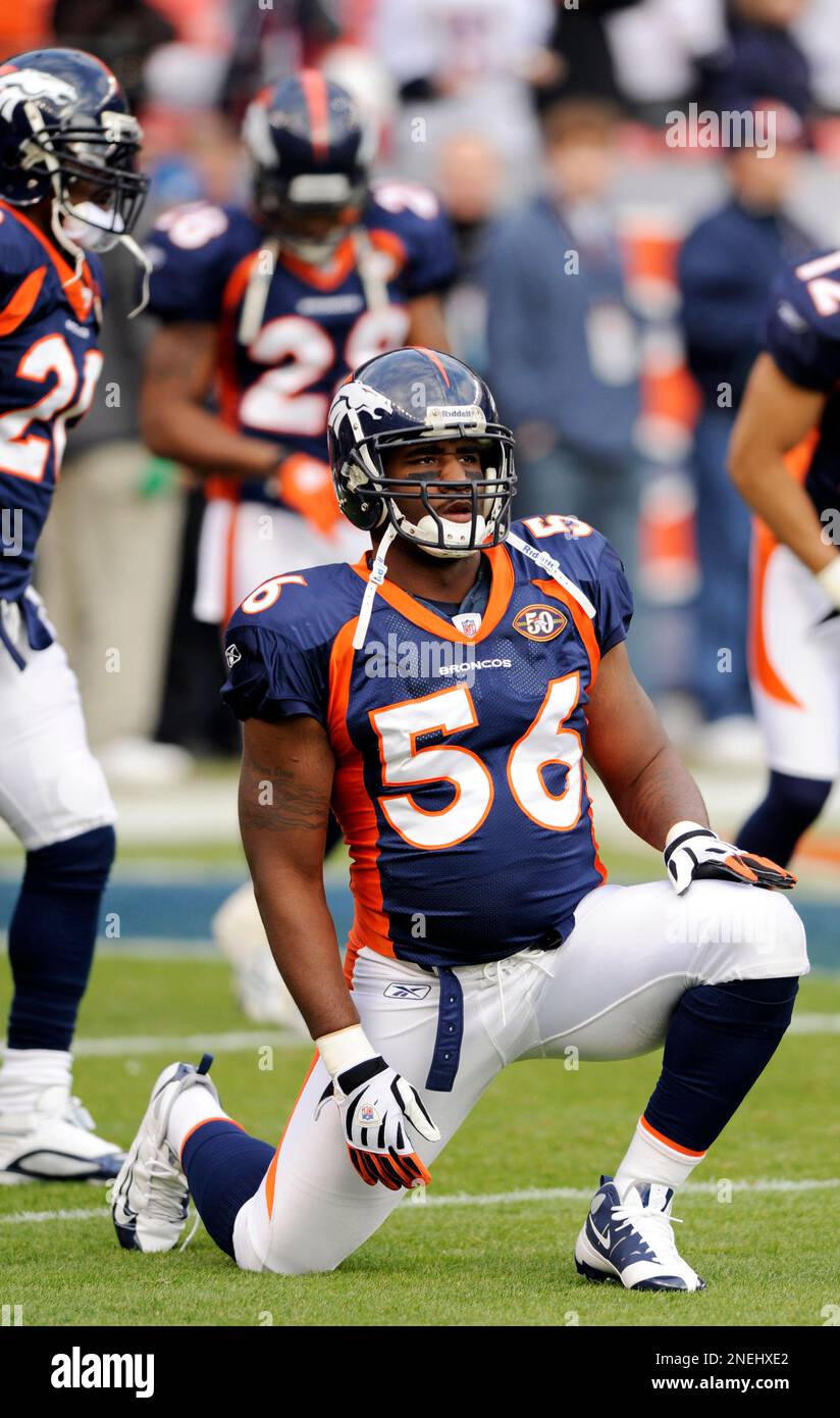 Denver Broncos player Robert Ayers warms up before the NFL football ...