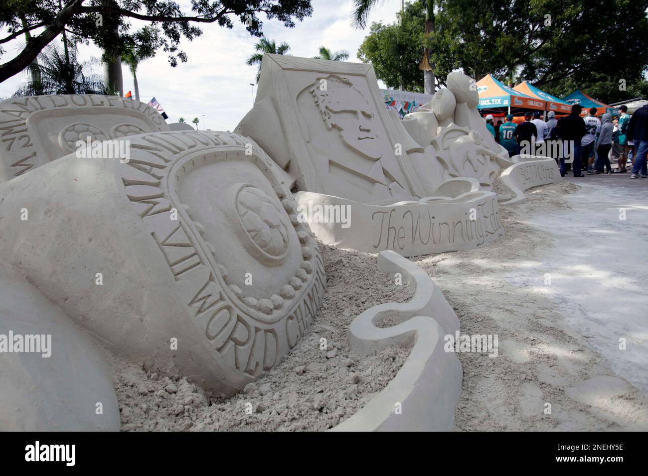 A sand sculpture featuring an image of former Miami Dolphins head coach ...