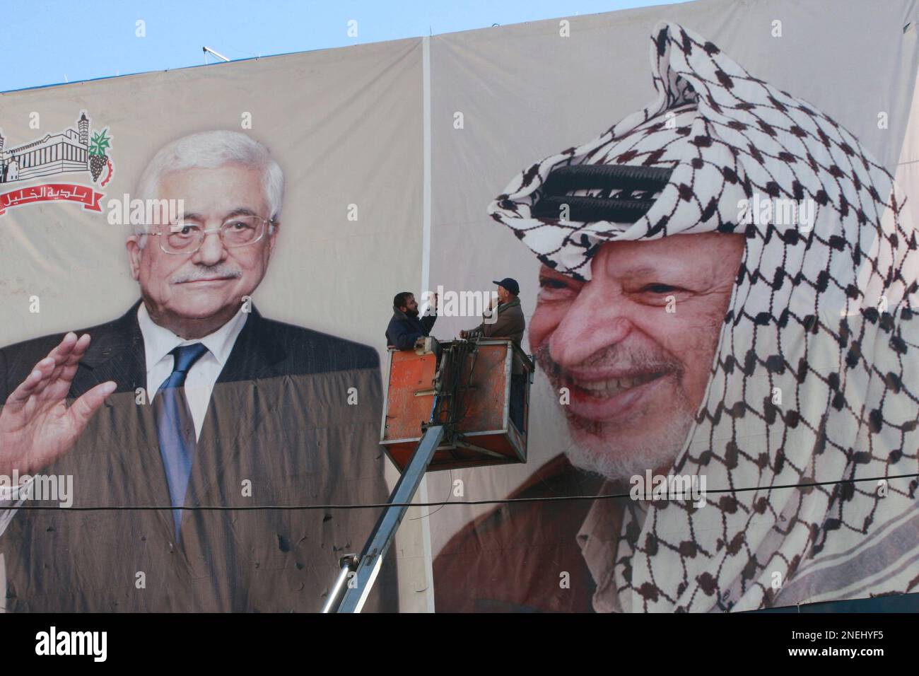Huge portraits of late Palestinian leader Yasser Arafat and Palestinian ...