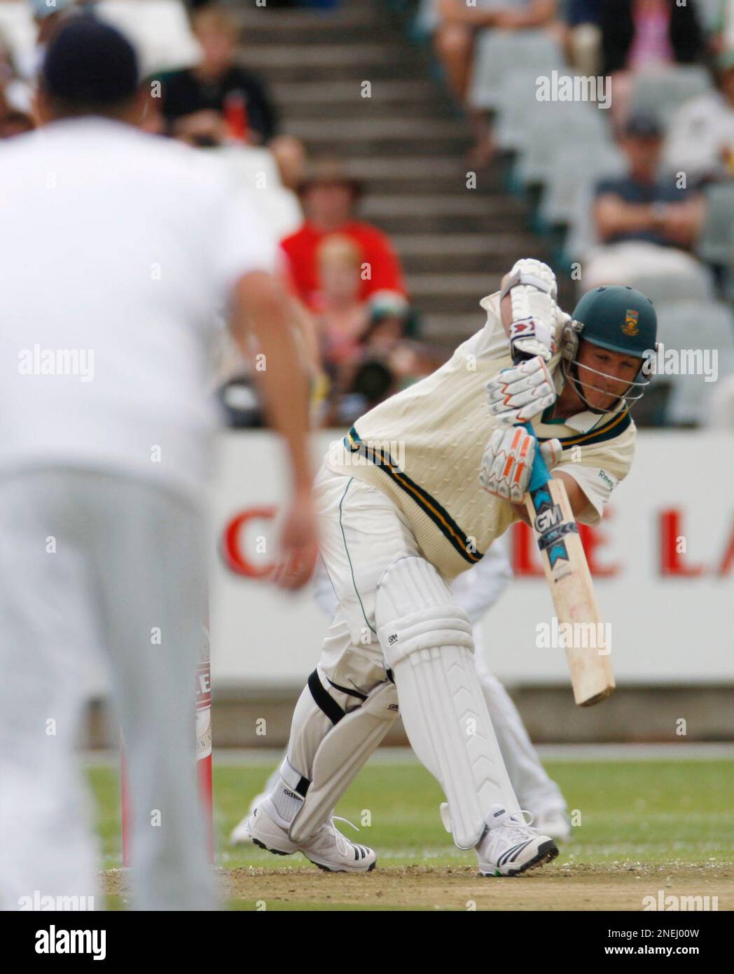 South Africa's Graeme Smith, right, plays a shot during their third ...
