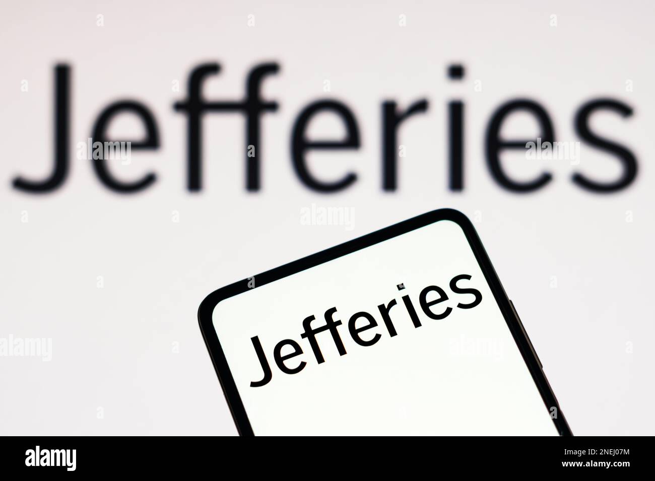 In this photo illustration the Jefferies Group logo seen displayed on a ...