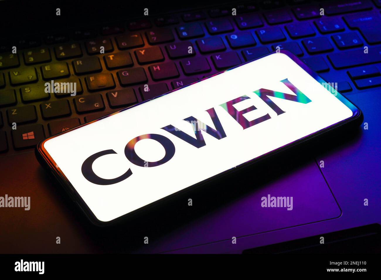 In this photo illustration the Cowen Inc. logo seen displayed on a ...