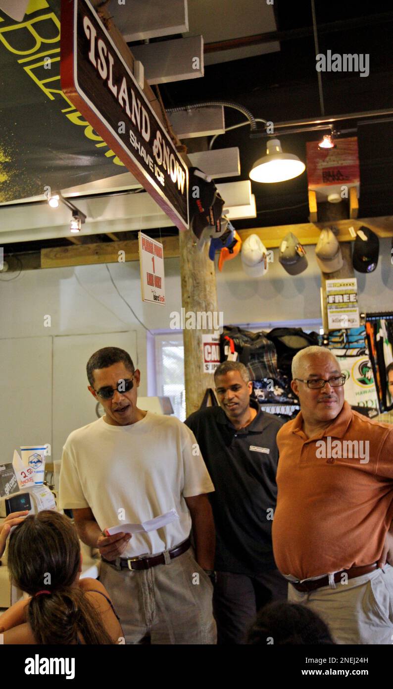 President Barack Obama, left, with friends Marty Nesbitt, and Dr. Eric ...