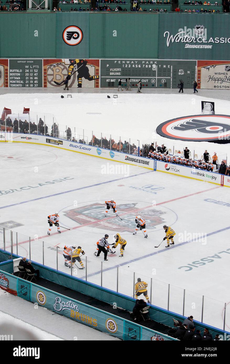 Boston Bruins center Marc Savard (91) wins a face-off against the ...